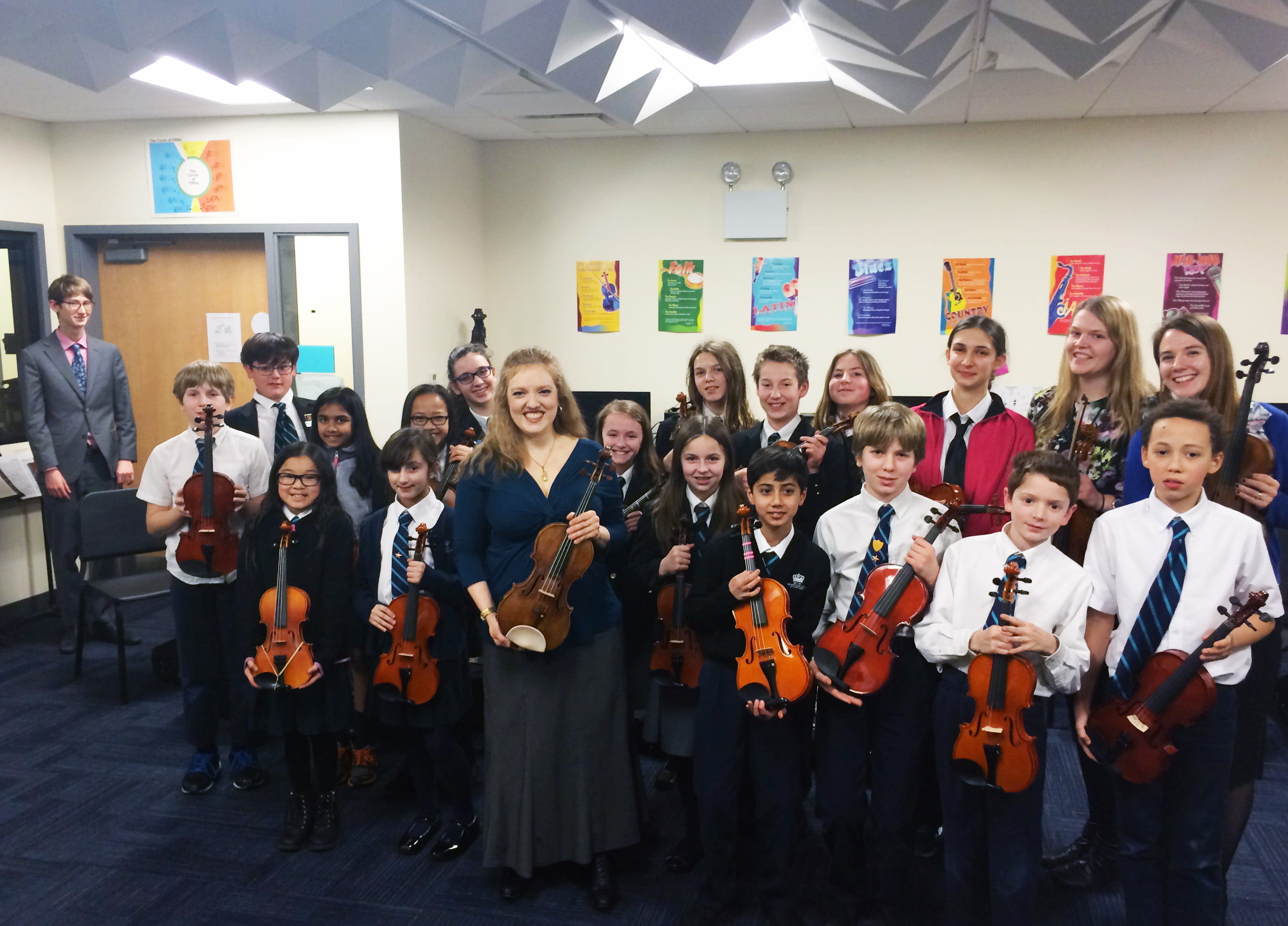 Violinists Engage in Workshop with Acclaimed Musician